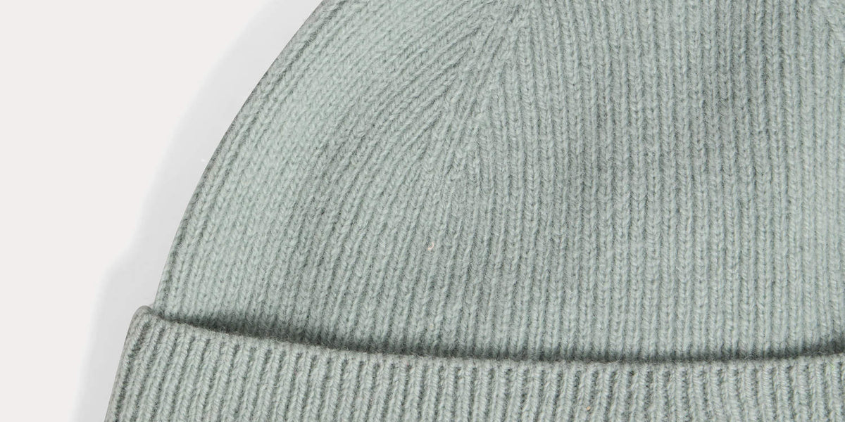 Bonpoint Benny cap with cuff and vignette in aqua blue wool