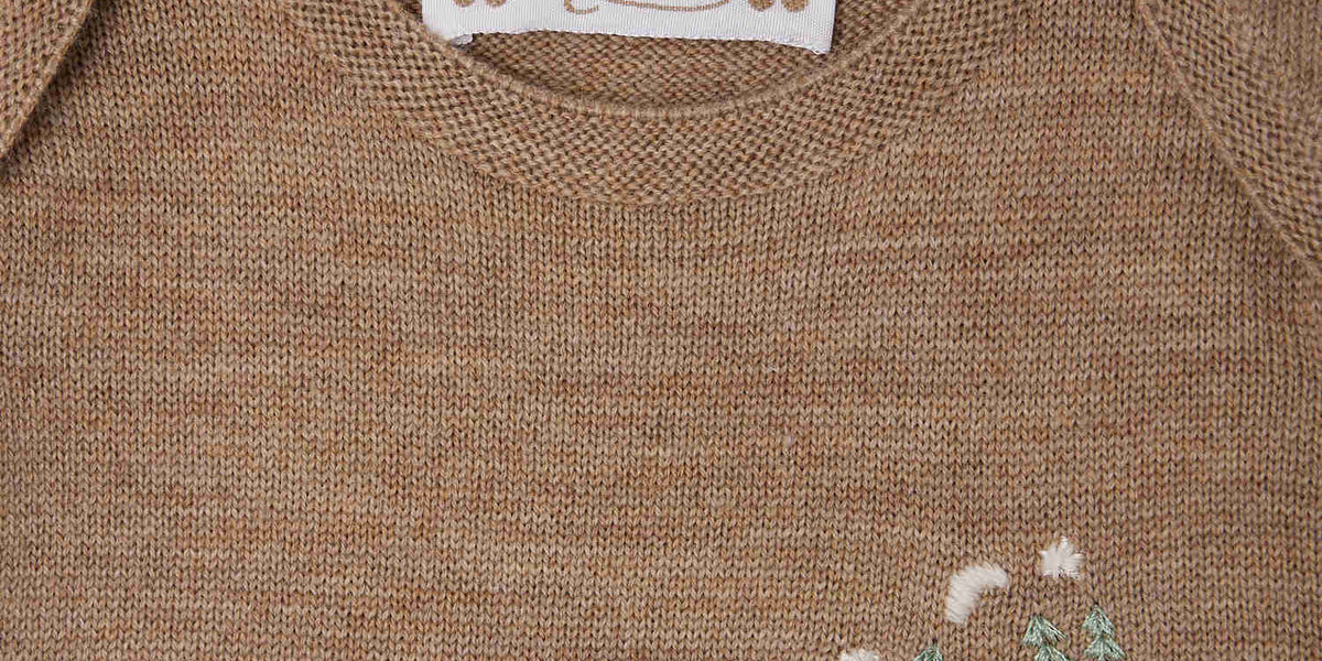 Cielo jumpsuit with American neckline and wool embroidery on the chest ...